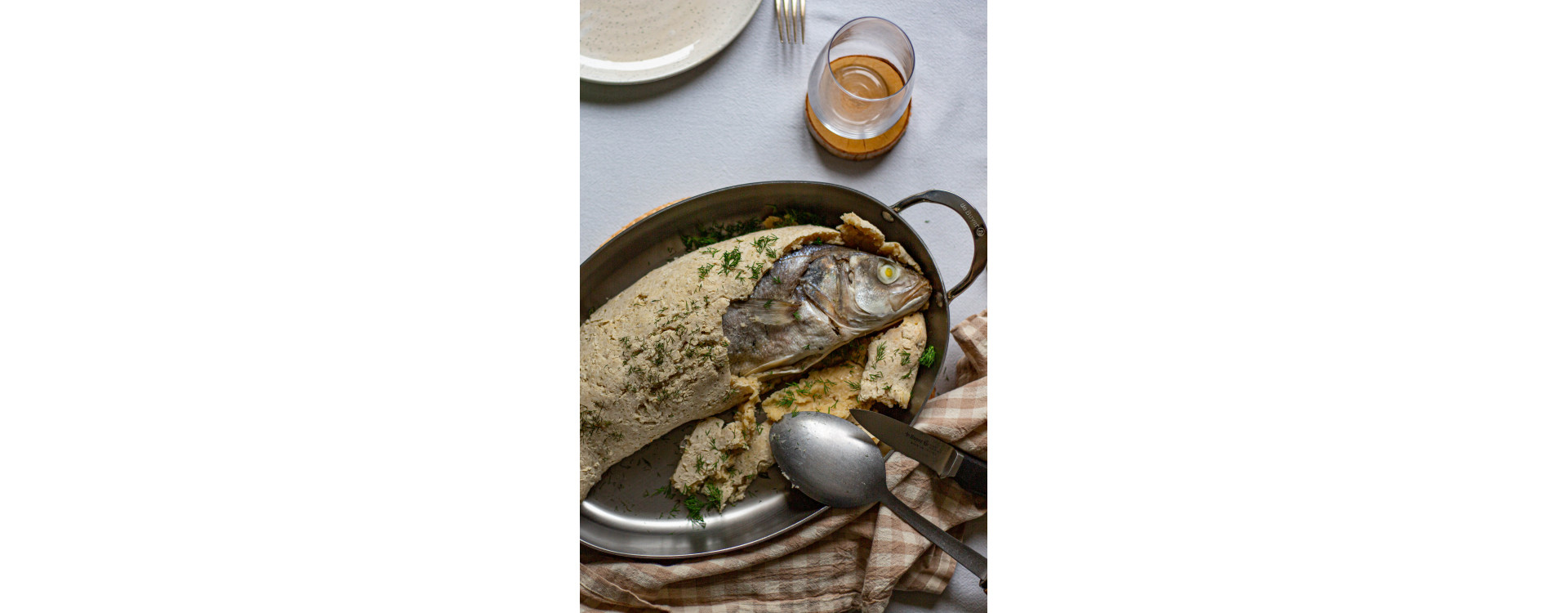 Salt-crusted sea bass